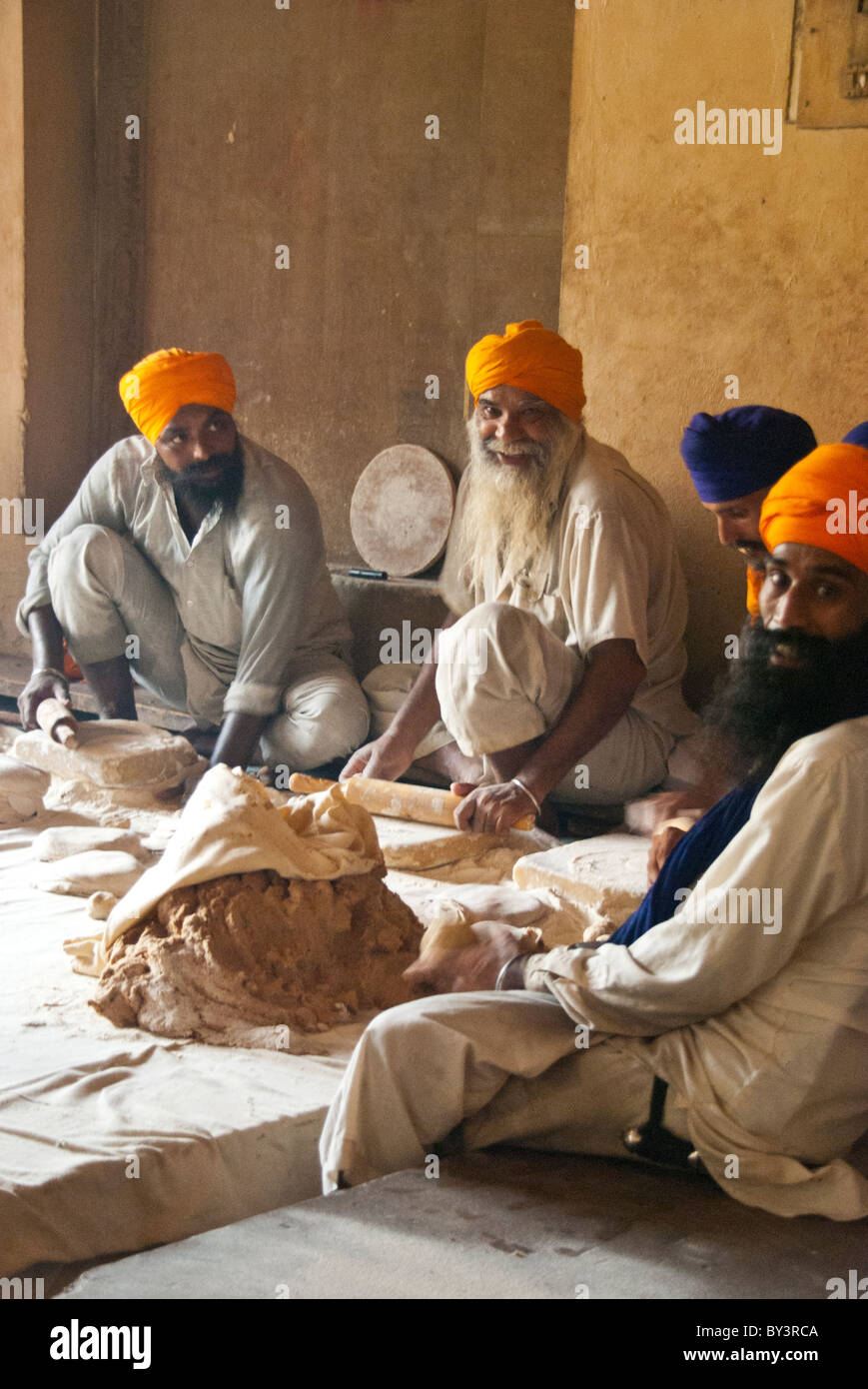 Rolling the chapati mixture Stock Photo - Alamy