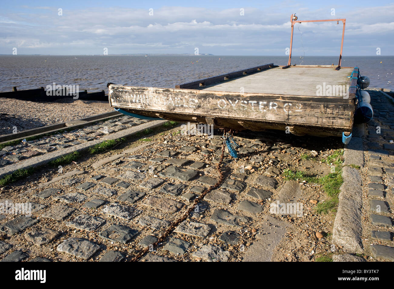 oyster sledge on slip way slipway Stock Photo - Alamy