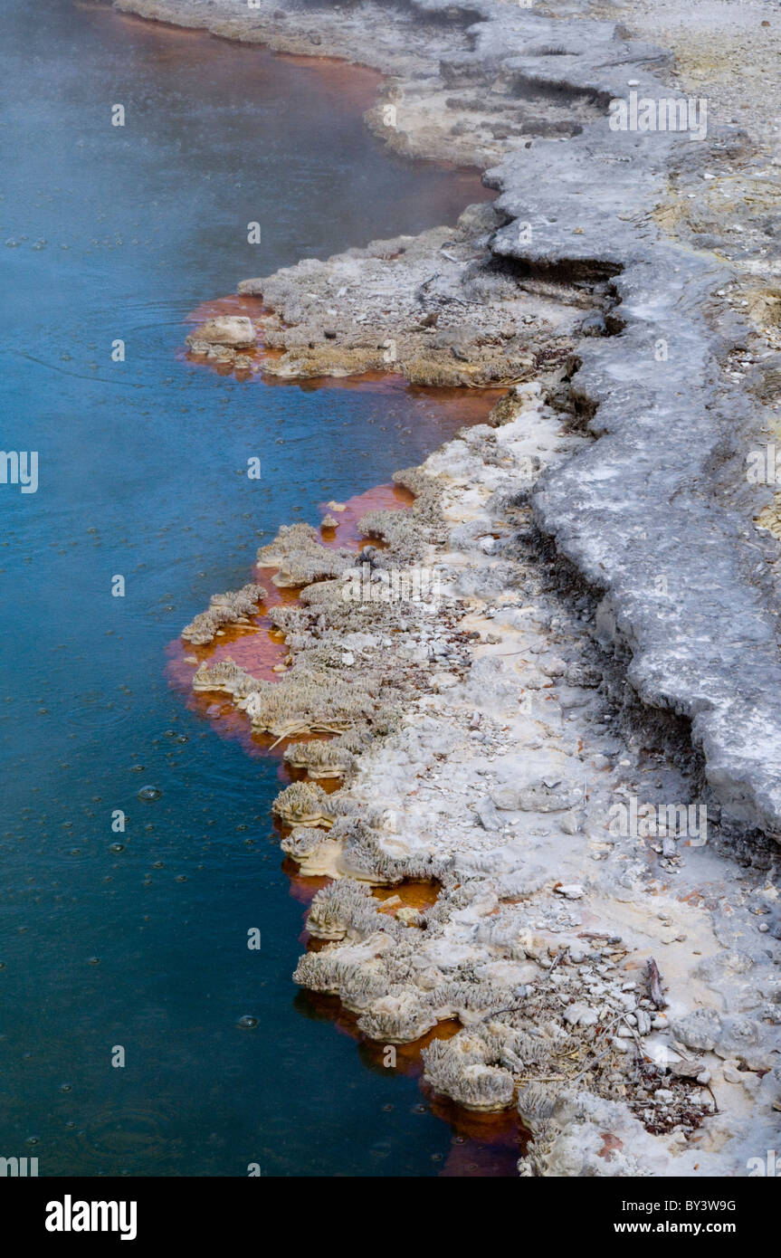 Antimony sinter gives the orange colour to the Champagner Pool called ...