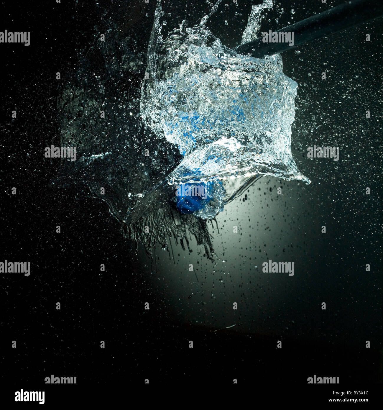 balloon filled with water exploding Stock Photo - Alamy