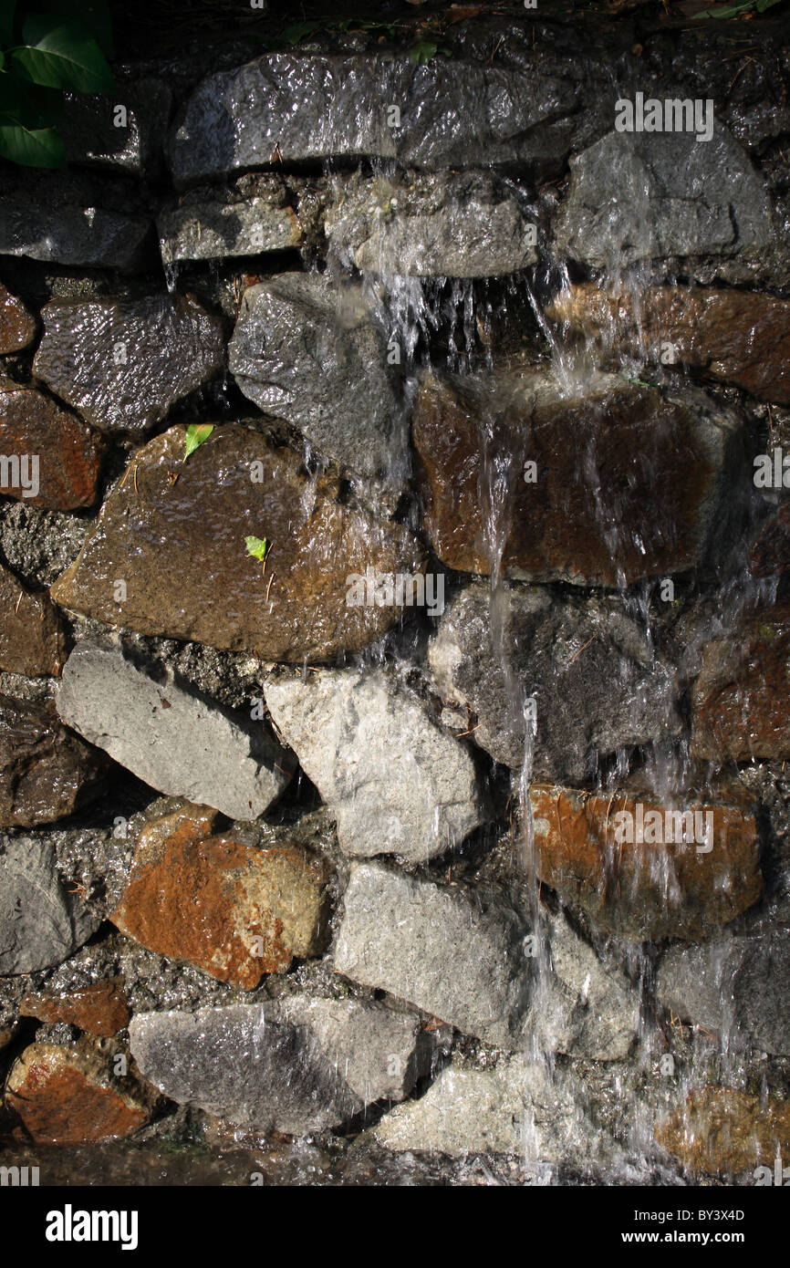 Water flowing down on stones Stock Photo - Alamy