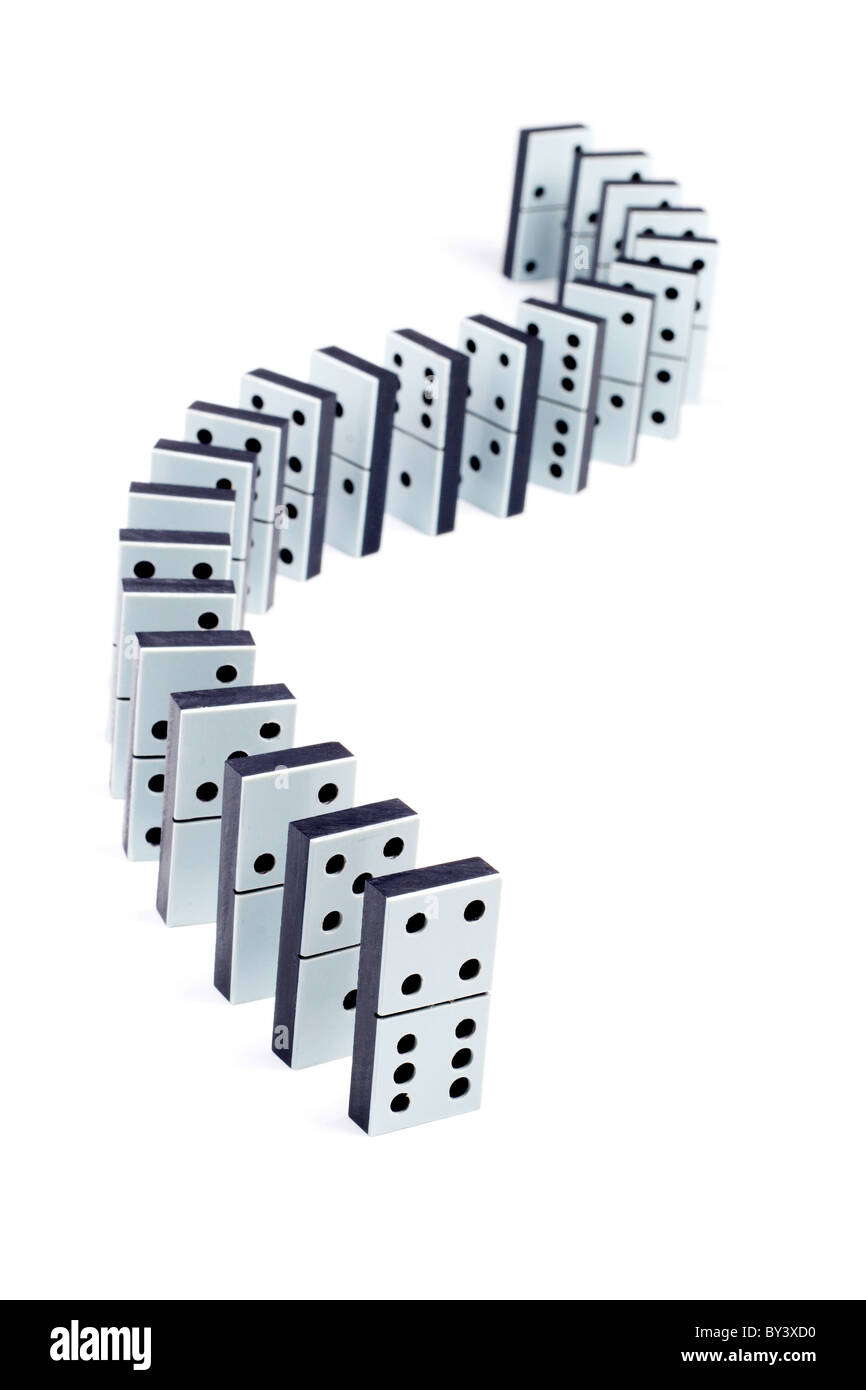 Domino pieces in a line on white background Stock Photo - Alamy