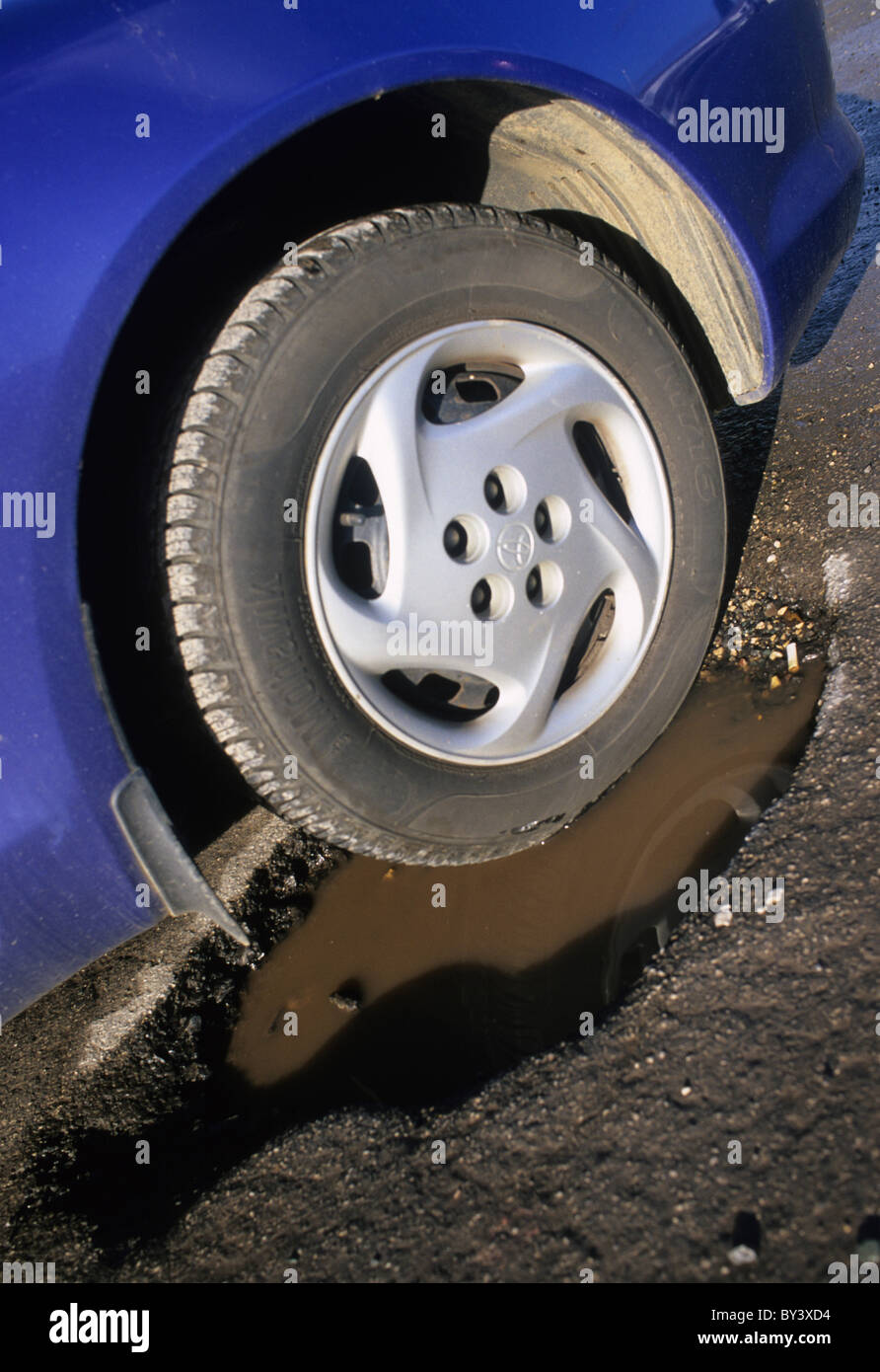 Pot hole damaged wheel hi-res stock photography and images - Alamy