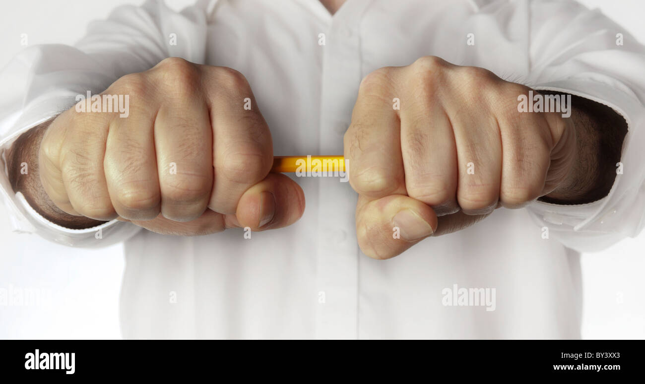 Hands breaking pencil hi-res stock photography and images - Alamy