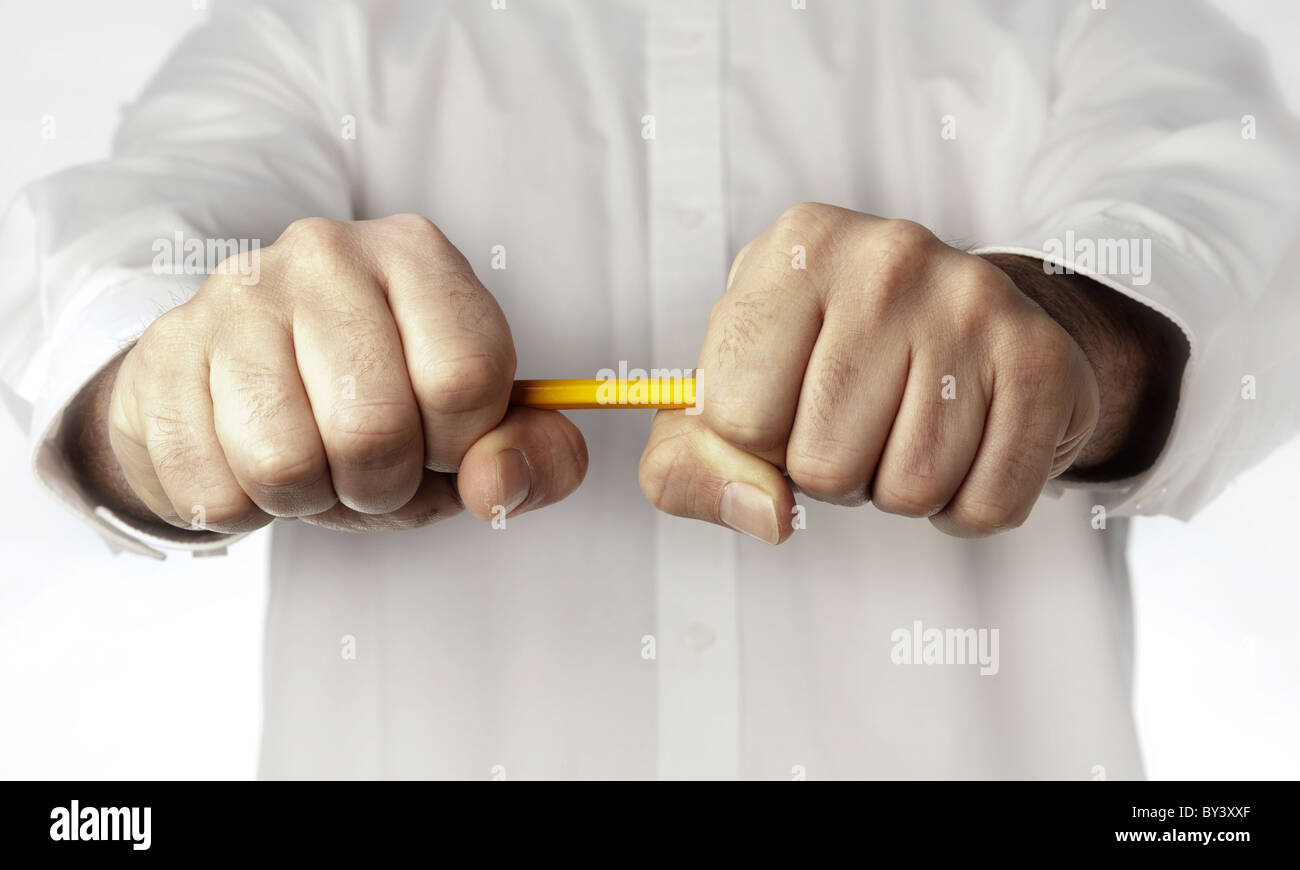 close up detail of mans hands breaking a pencil Stock Photo - Alamy