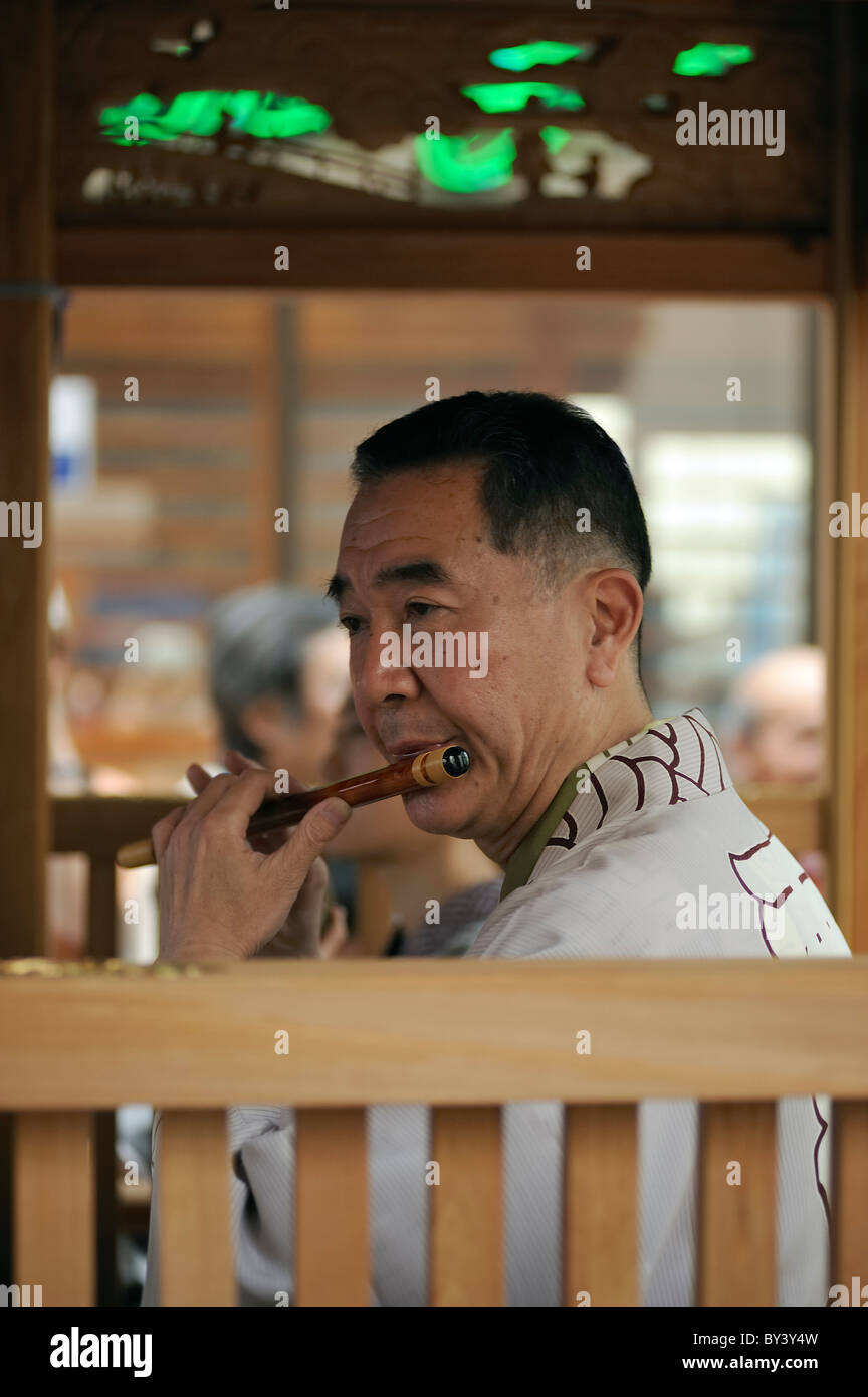 Japanese flutist on wooden float, Sanja Matsuri, Asakusa, Tokyo, Japan ...