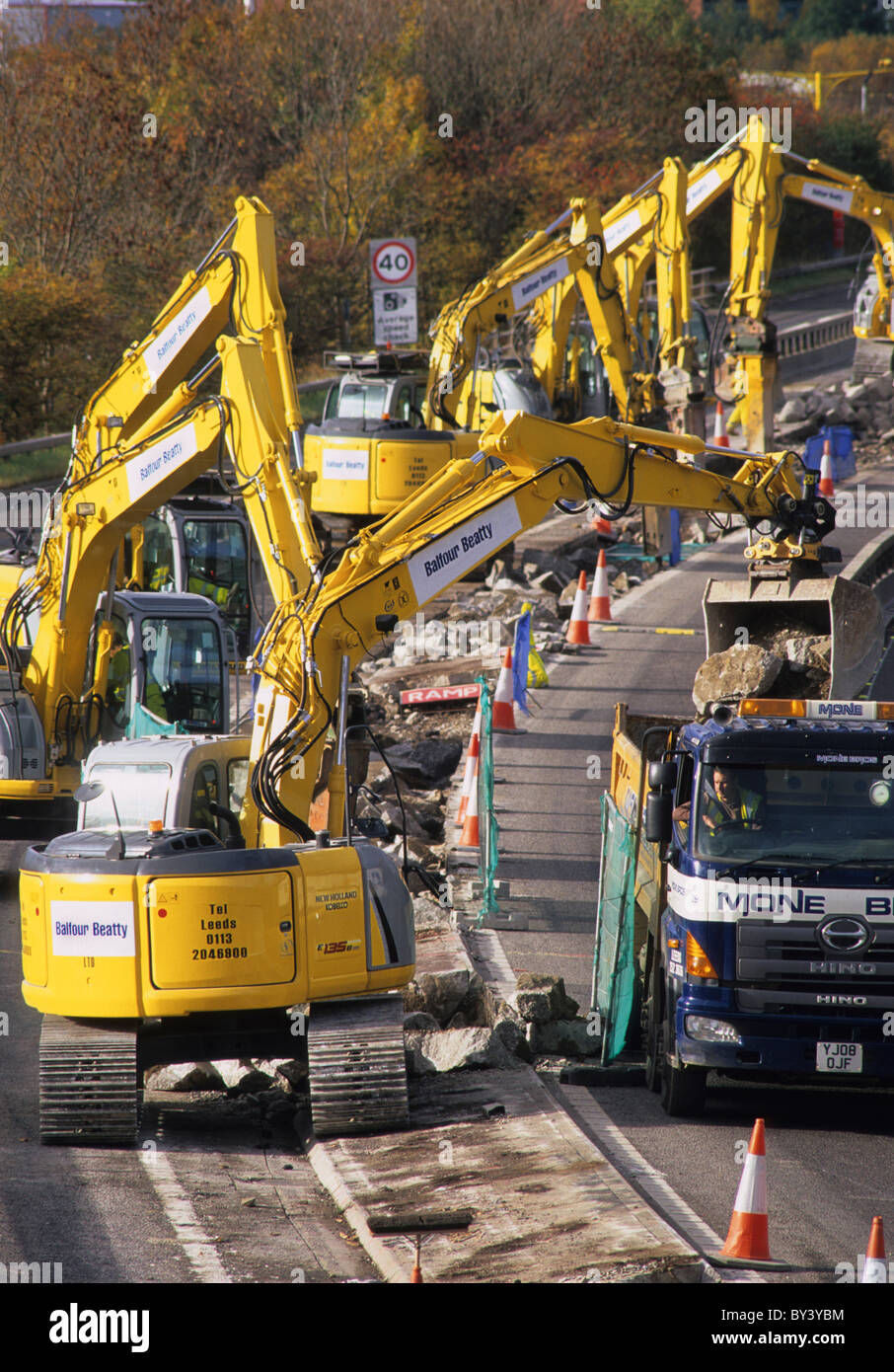 diggers working at roadworks and upgrade of the M621 motorway in the ...