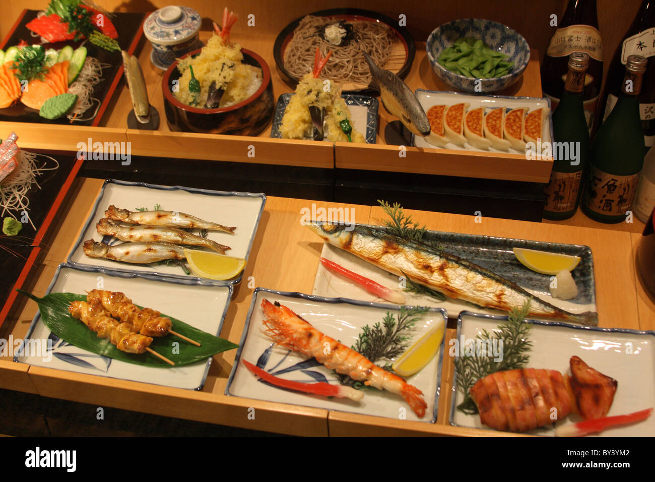Japanese food display on shop front Stock Photo - Alamy