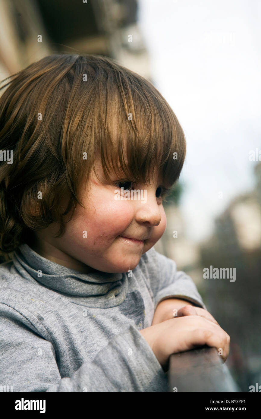 Toddler looking over railing hi-res stock photography and images - Alamy
