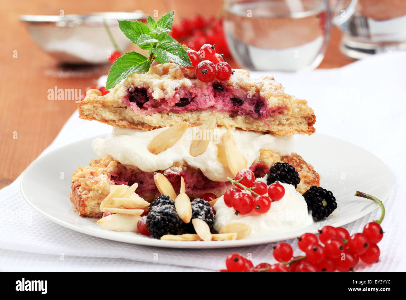 Berry fruit cake with sweet cream cheese Stock Photo - Alamy