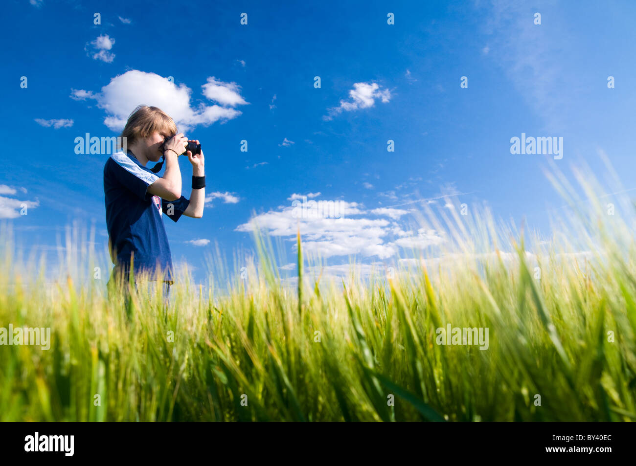 Photographer taking pictures outdoors Stock Photo - Alamy