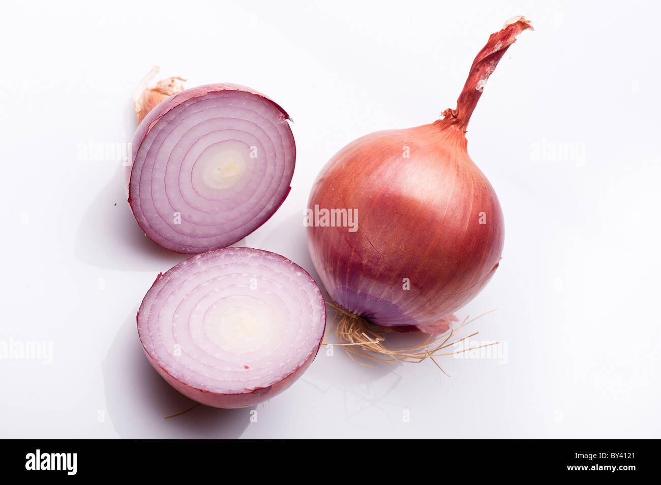 Cut and whole Purple (red) onion on white Background Stock Photo - Alamy