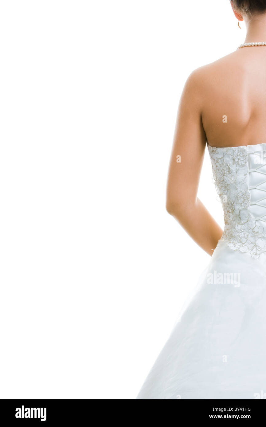 Image of back of bride in wedding dress isolated on a white background ...