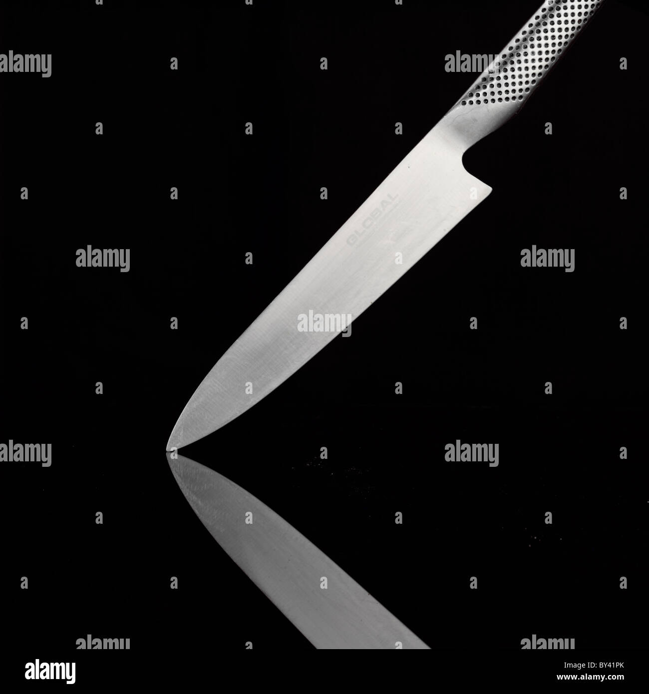 Chefs knife on black background Stock Photo - Alamy