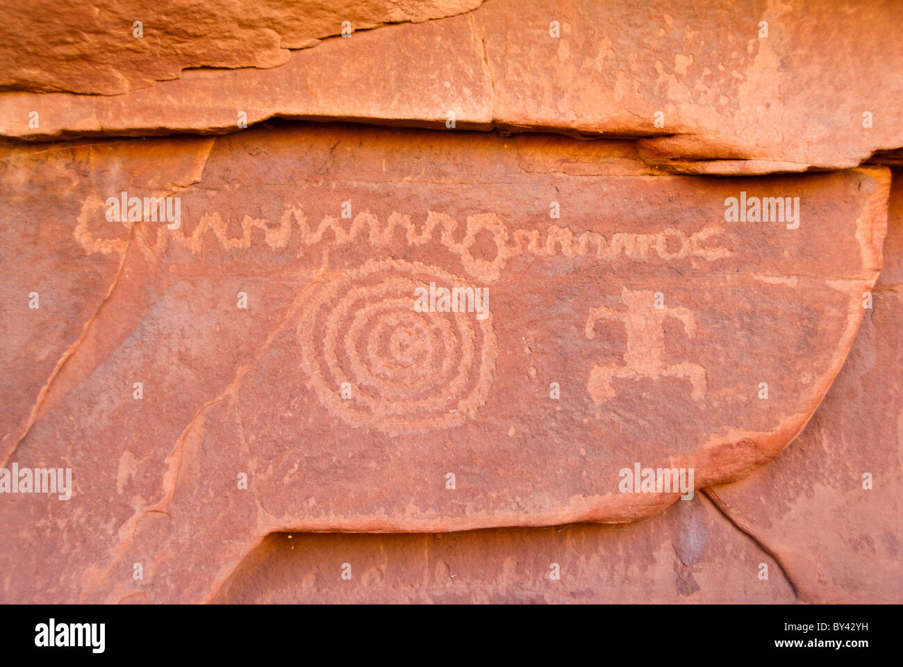 Springdale, Utah: Ancient petroglyph's adorn the sandstone walls of ...