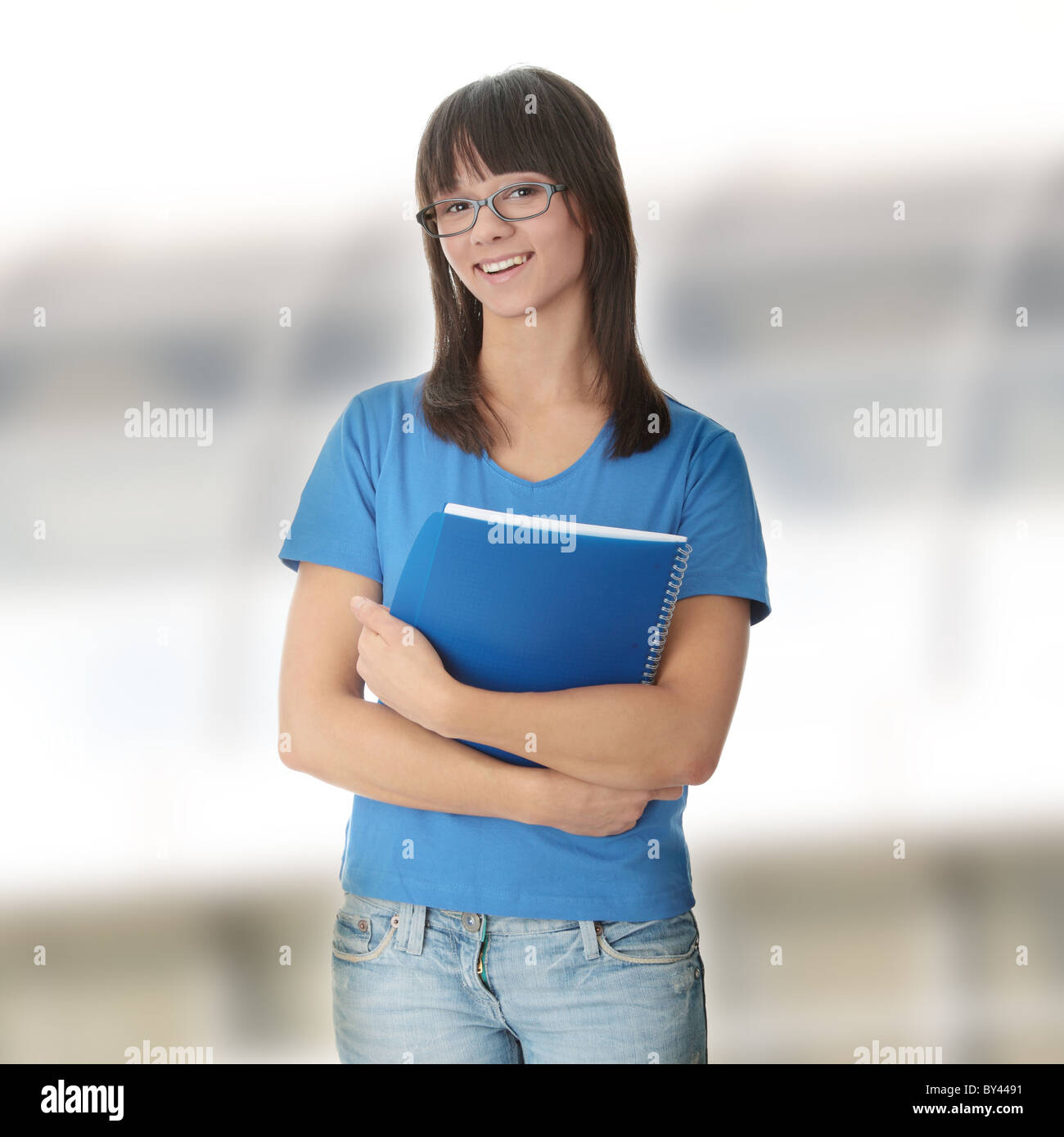 Teen student girl with note pad,isolated on white background Stock ...