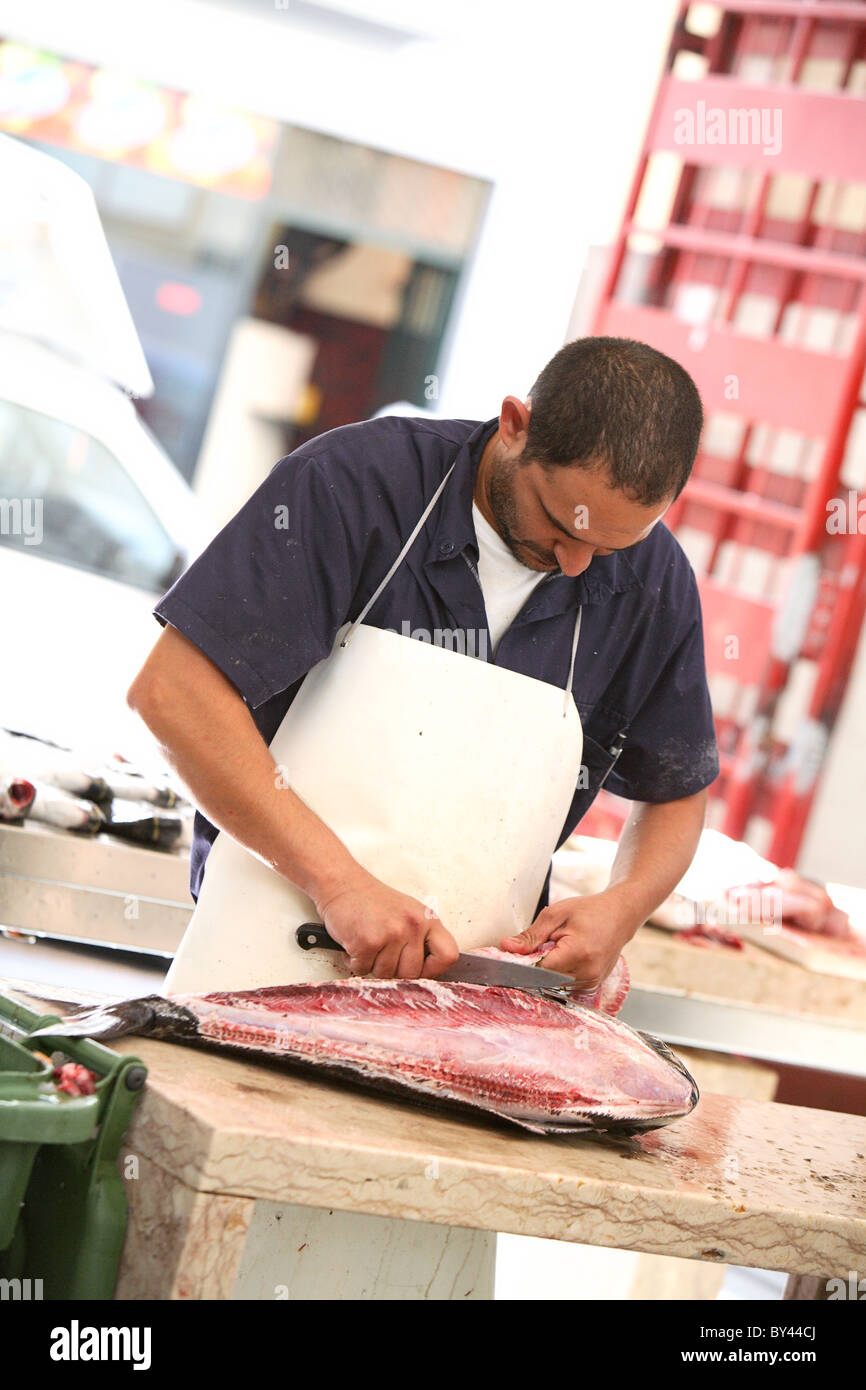 fishmonger at work Fish Market Funchal Madeira Stock Photo - Alamy