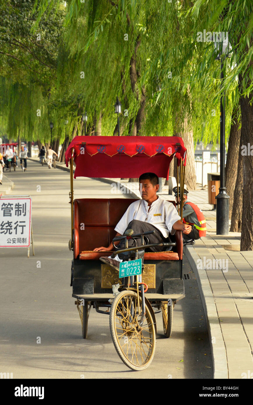 Rickshaw china driver hi-res stock photography and images - Alamy