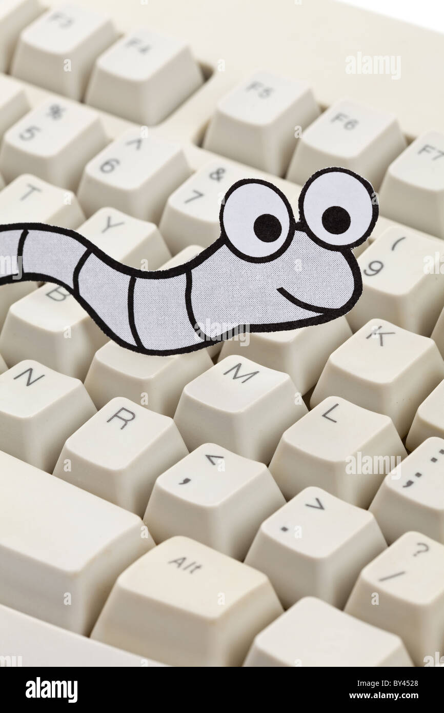Worm and computer keyboard, concept of Security, Virus Stock Photo - Alamy