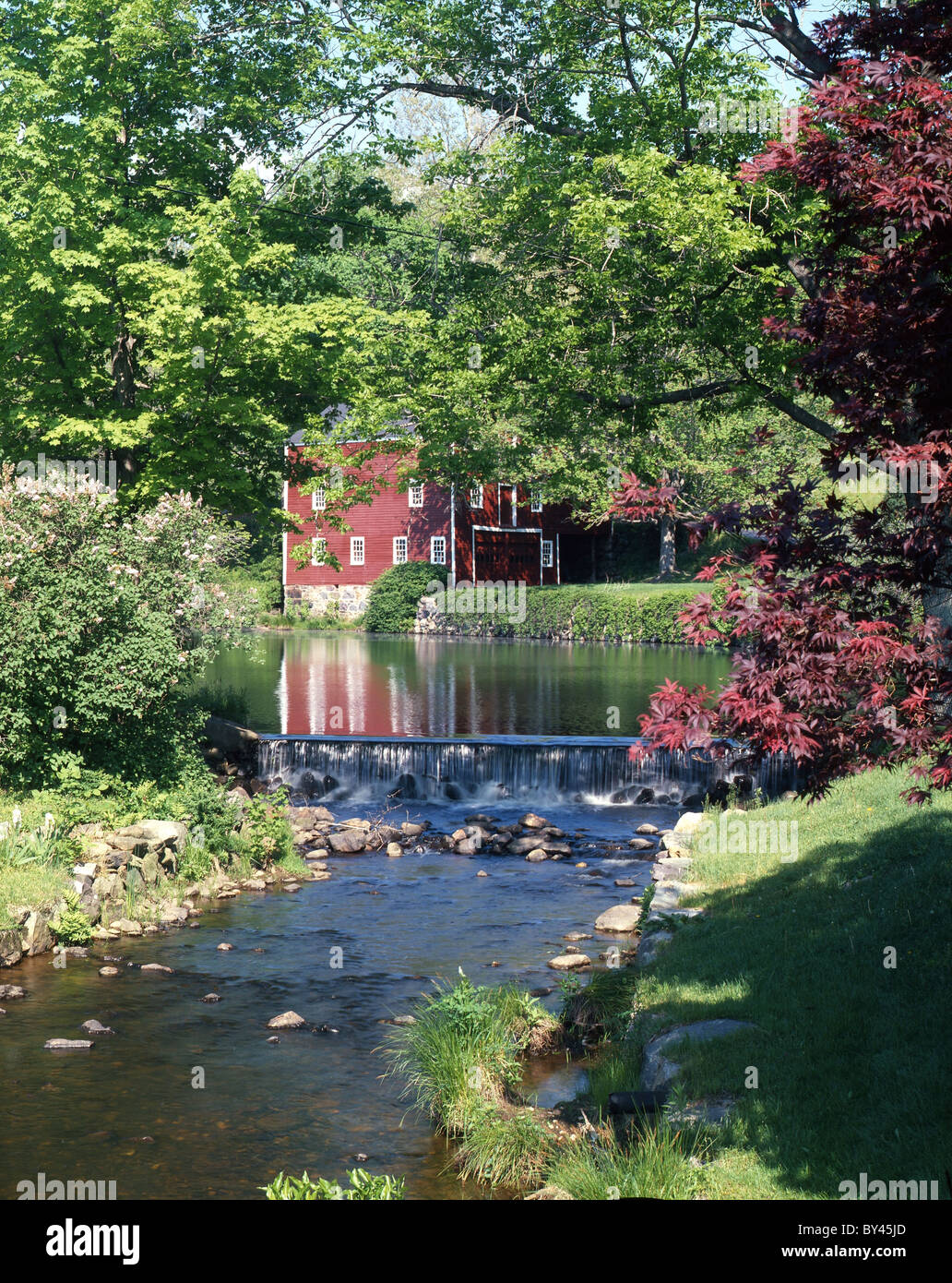 House with Pond and Brook Stock Photo - Alamy