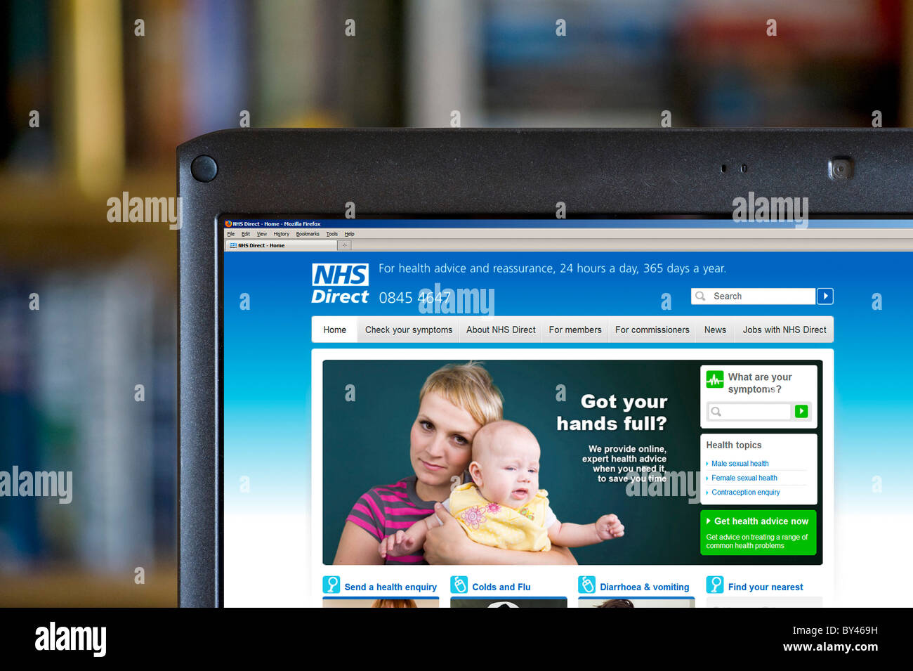 Looking at symptoms on the NHS Direct website, UK Stock Photo - Alamy