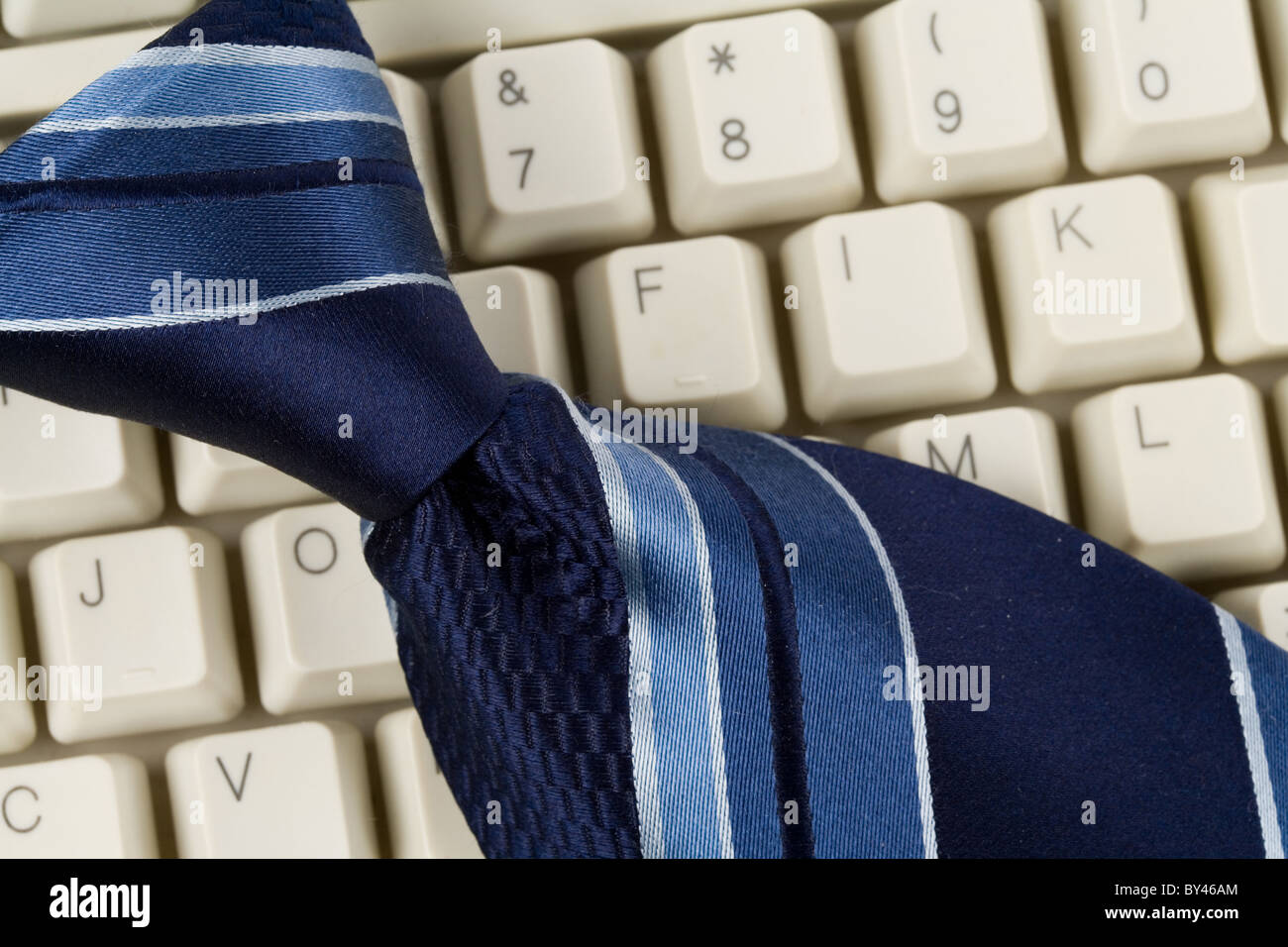 Blue Necktie and Keyboard close up shot Stock Photo - Alamy
