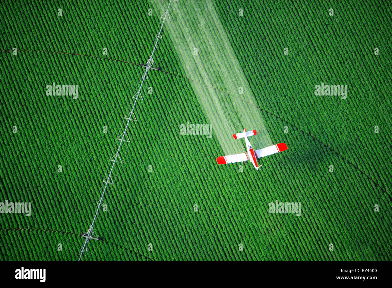 Aerial View of a crop duster spraying a farm field Stock Photo - Alamy