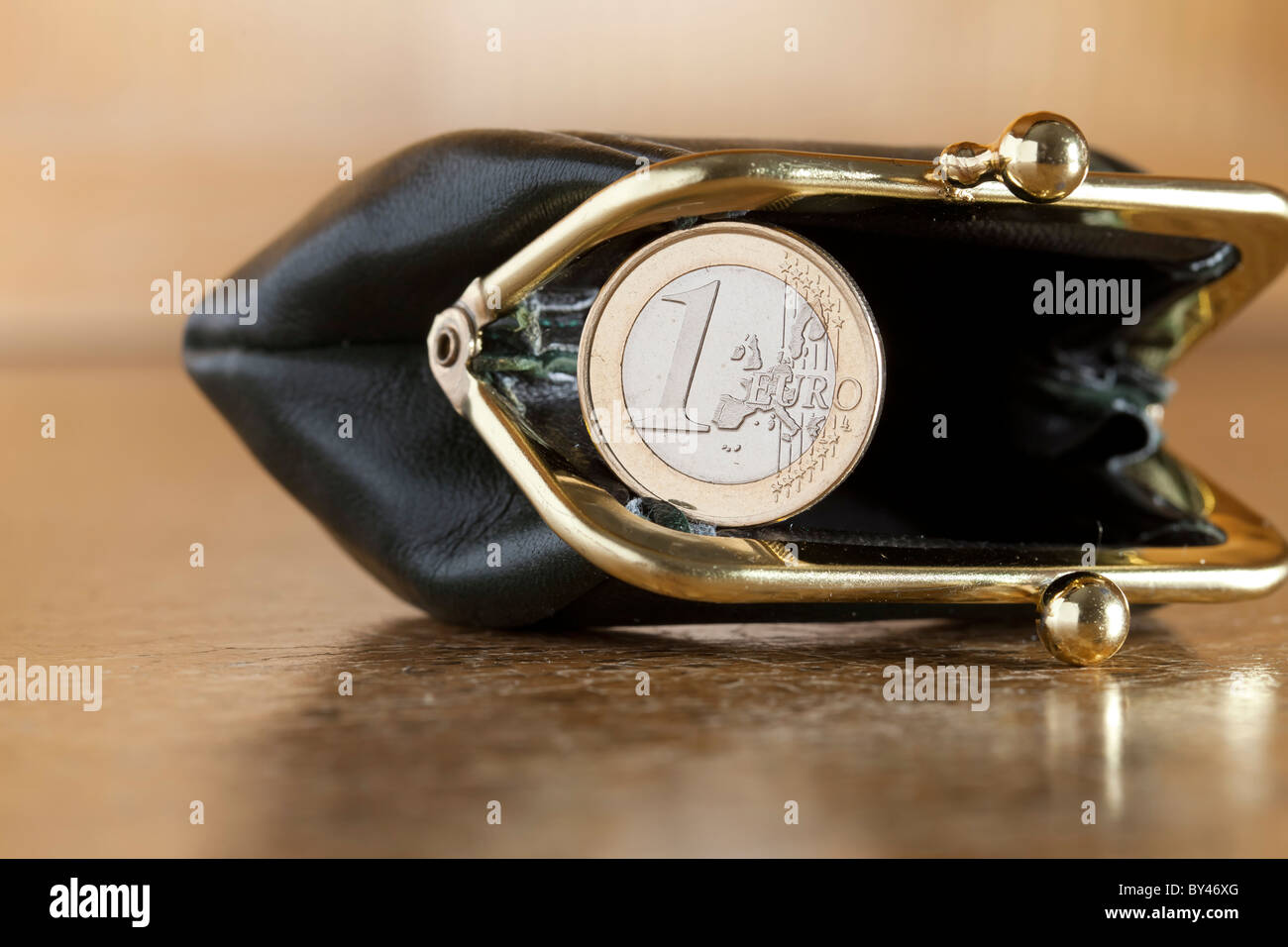 1 Euro coin in a wallet Stock Photo - Alamy