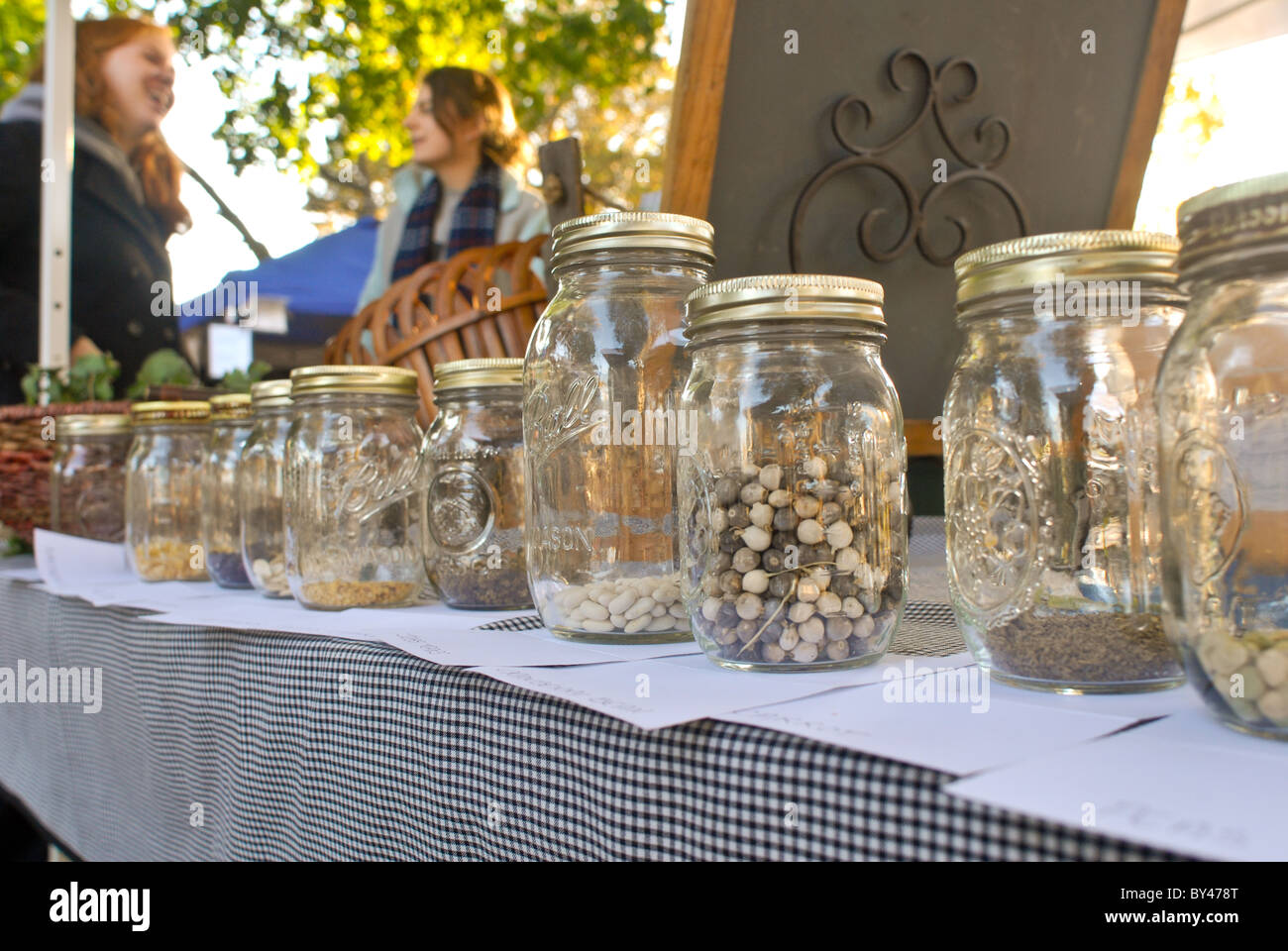 Seeds at farm market table Stock Photo - Alamy
