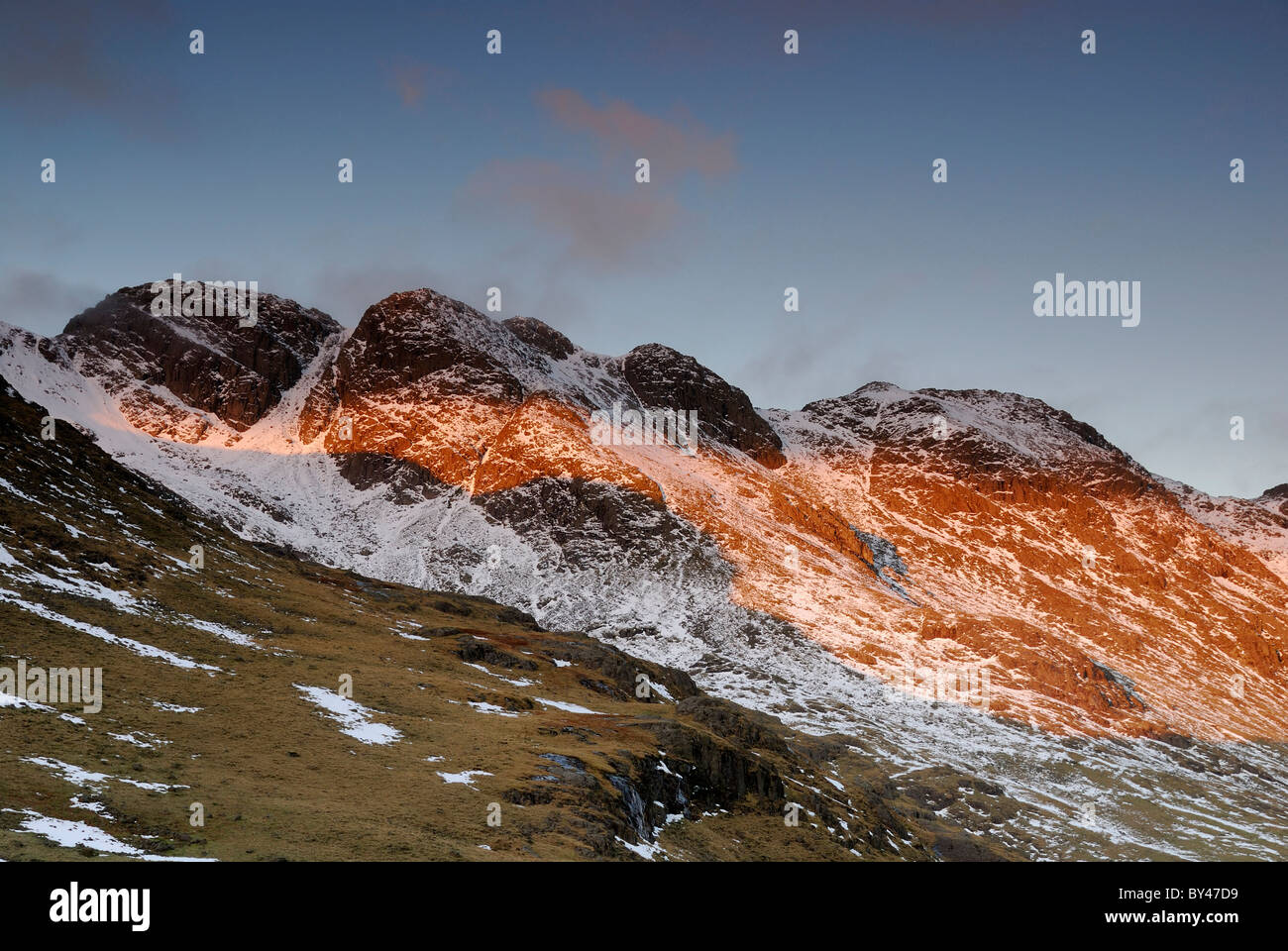 Early morning winter sunlight on Crinkle Crags in the English Lake ...