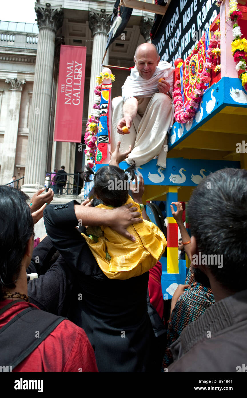 Hare Krishna distributing fruits to worshipers at the Ratha Yatra The ...
