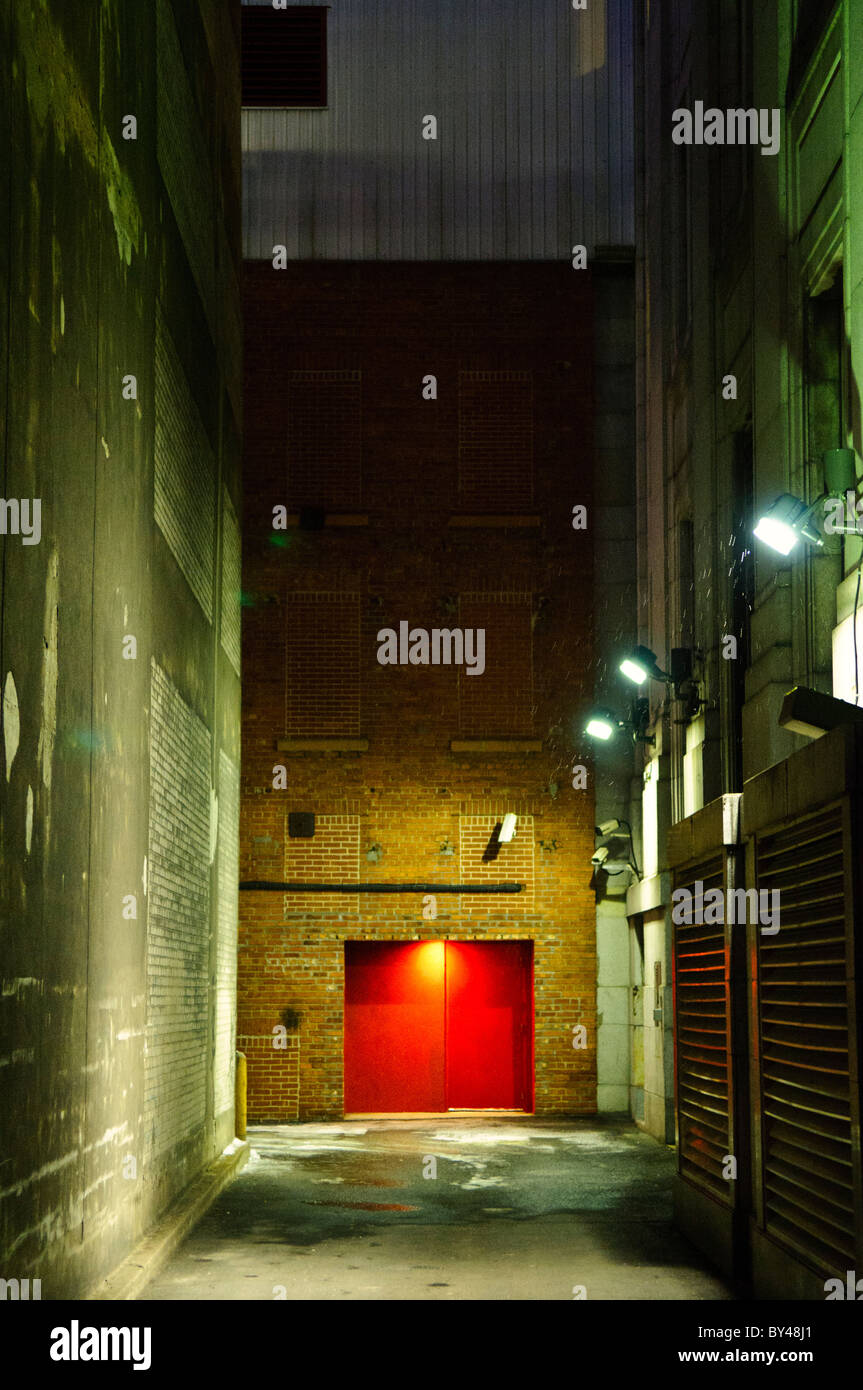 Red Door Alleyway Montreal // MONTREAL, Quebec — A vibrant red door ...