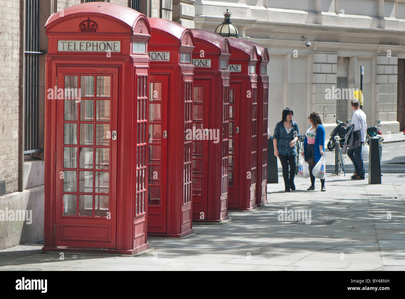 Five 5 Public red telephone boxes Broad Court, Covent Garden, London ...