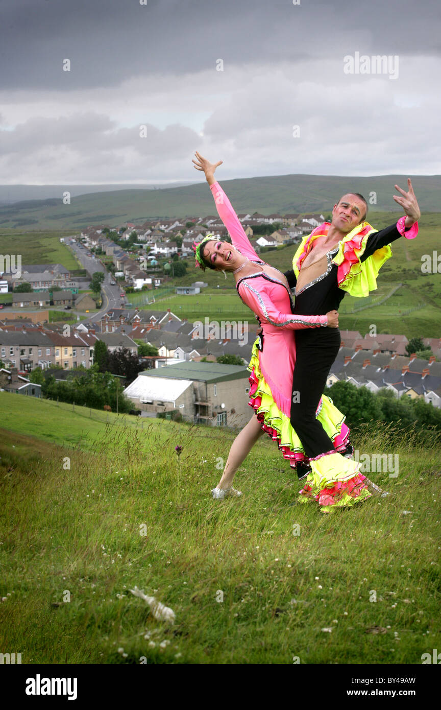Dancers dressed in costume in a field Stock Photo - Alamy