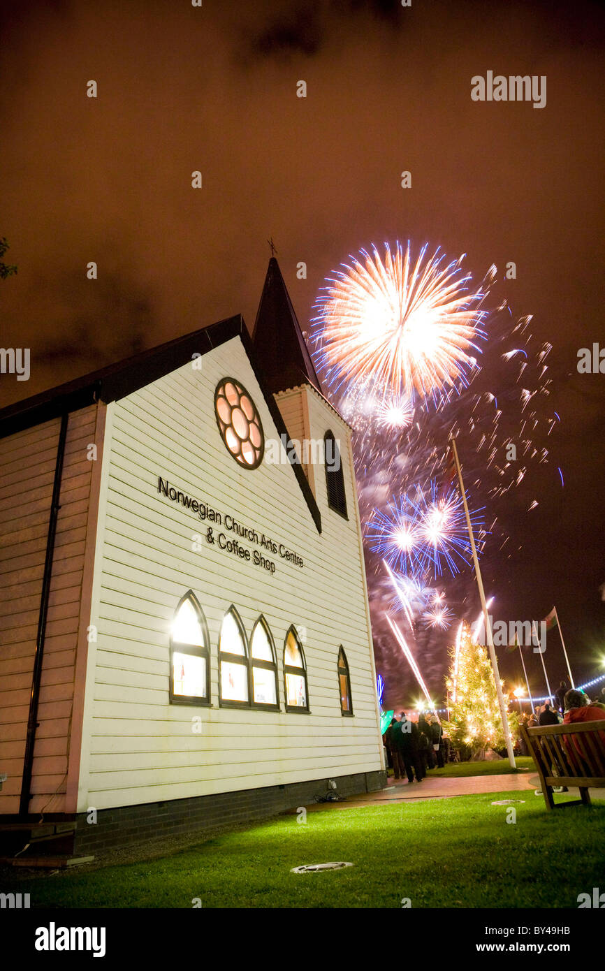 Lantern Procession in Cardiff Bay at Christmas. Fireworks in background ...