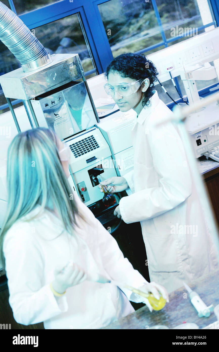 Scientists testing in university chemical laboratory Stock Photo - Alamy