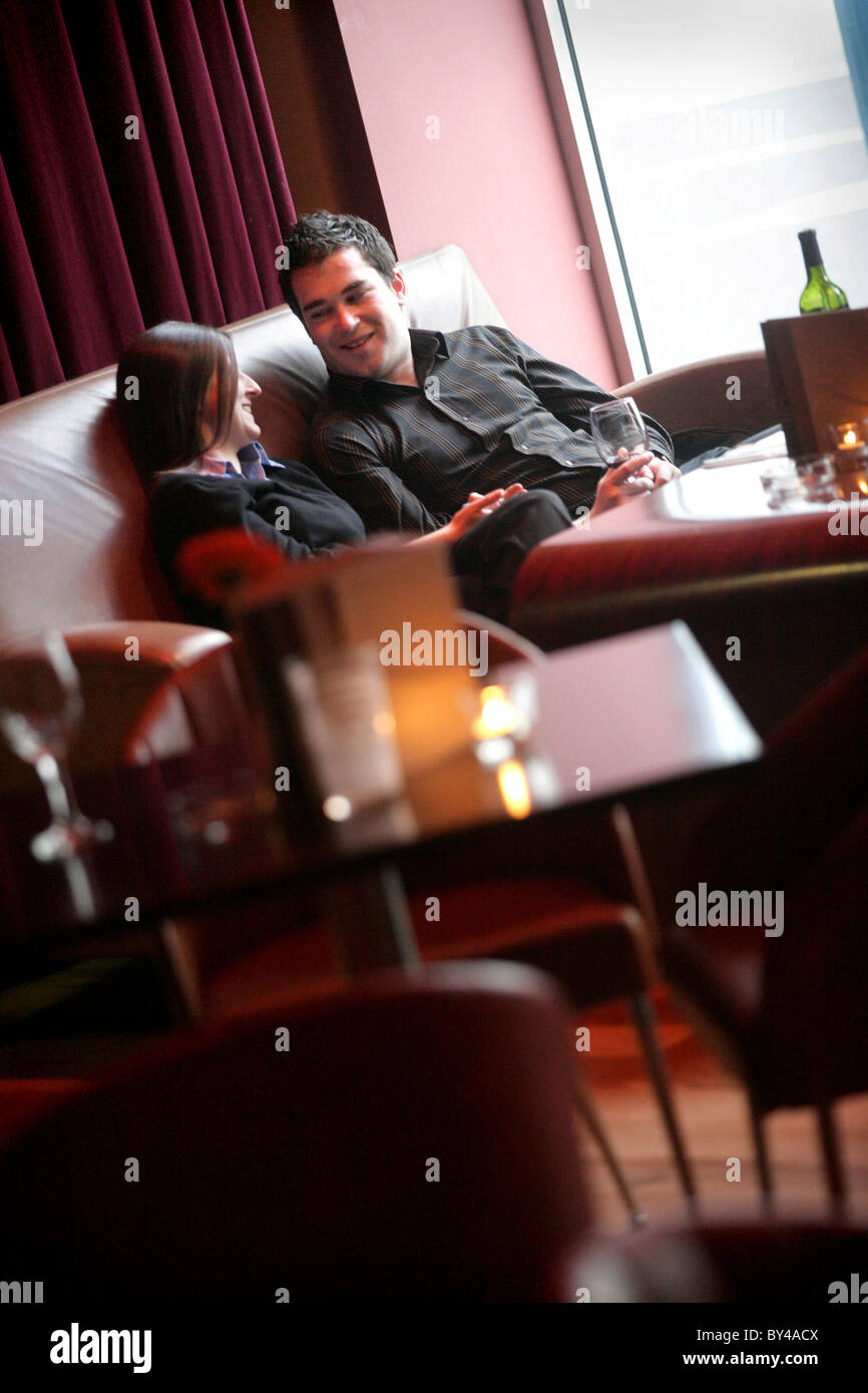 COUPLE DRINKING IN FAT CAT BAR, CARDIFF Stock Photo - Alamy