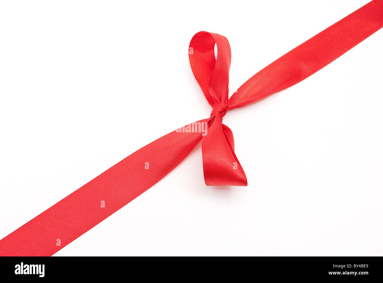 Red ribbon with bow Stock Photo - Alamy