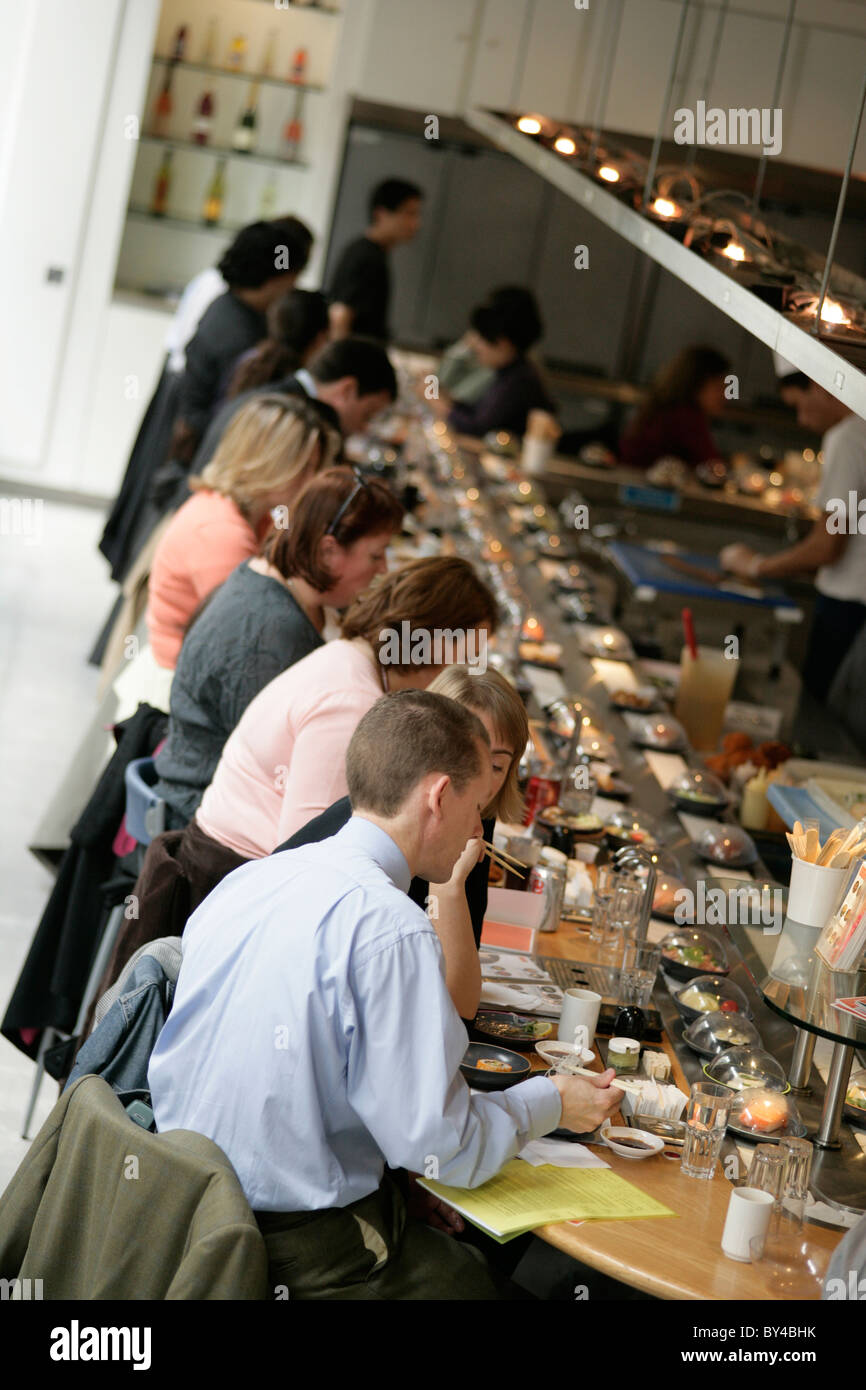 Busy Sushi bar Stock Photo - Alamy