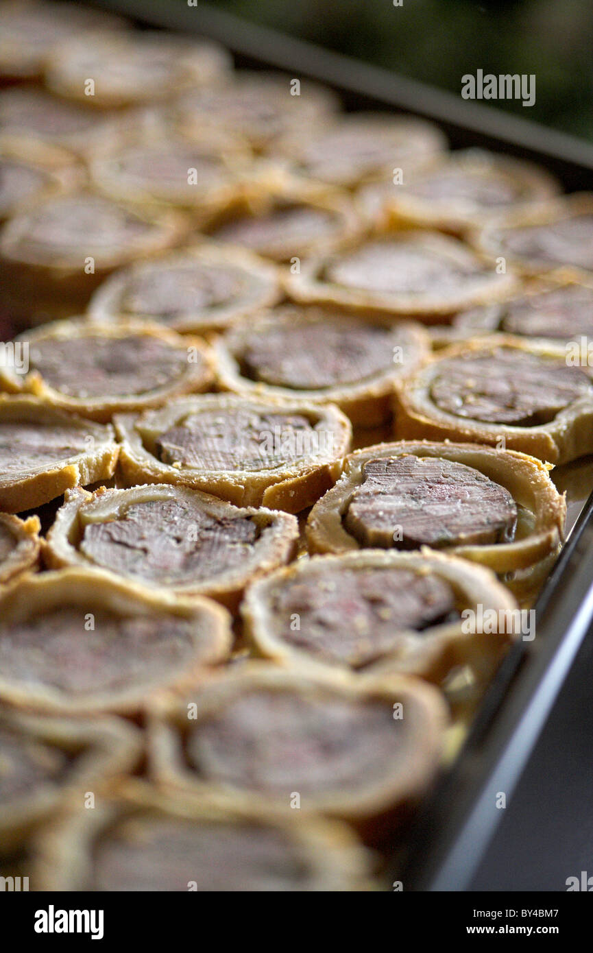 Sliced sausage roll on tray Stock Photo - Alamy