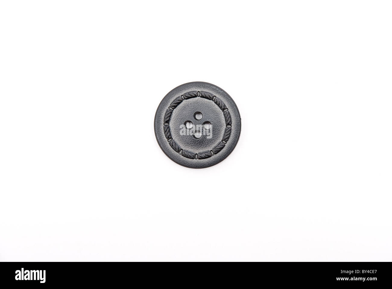Old button isolated on white Stock Photo - Alamy