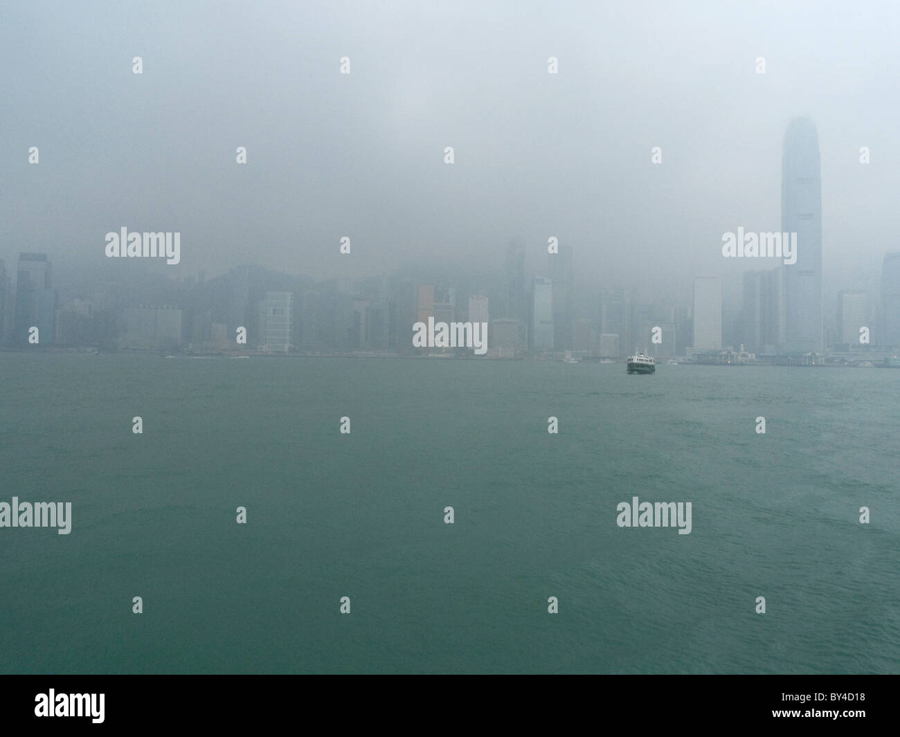 Disappearing buildings by fog and cloud, Victoria Harbour, Hong Kong ...