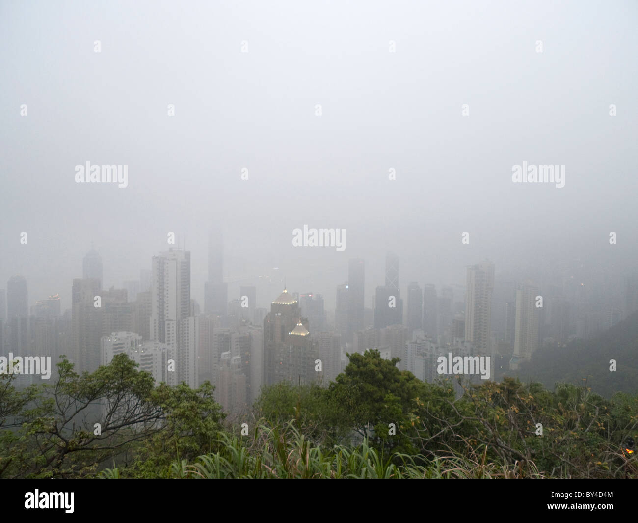 Disappearing buildings by fog and cloud, Hong Kong Stock Photo - Alamy