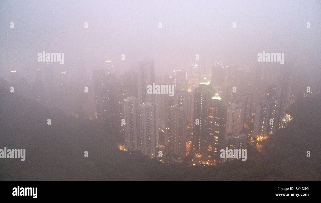 Disappearing buildings by fog and cloud, Hong Kong Stock Photo - Alamy