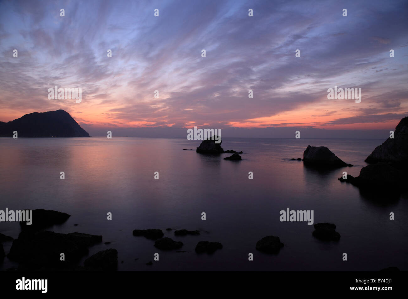 Ocean and sunrise Stock Photo - Alamy