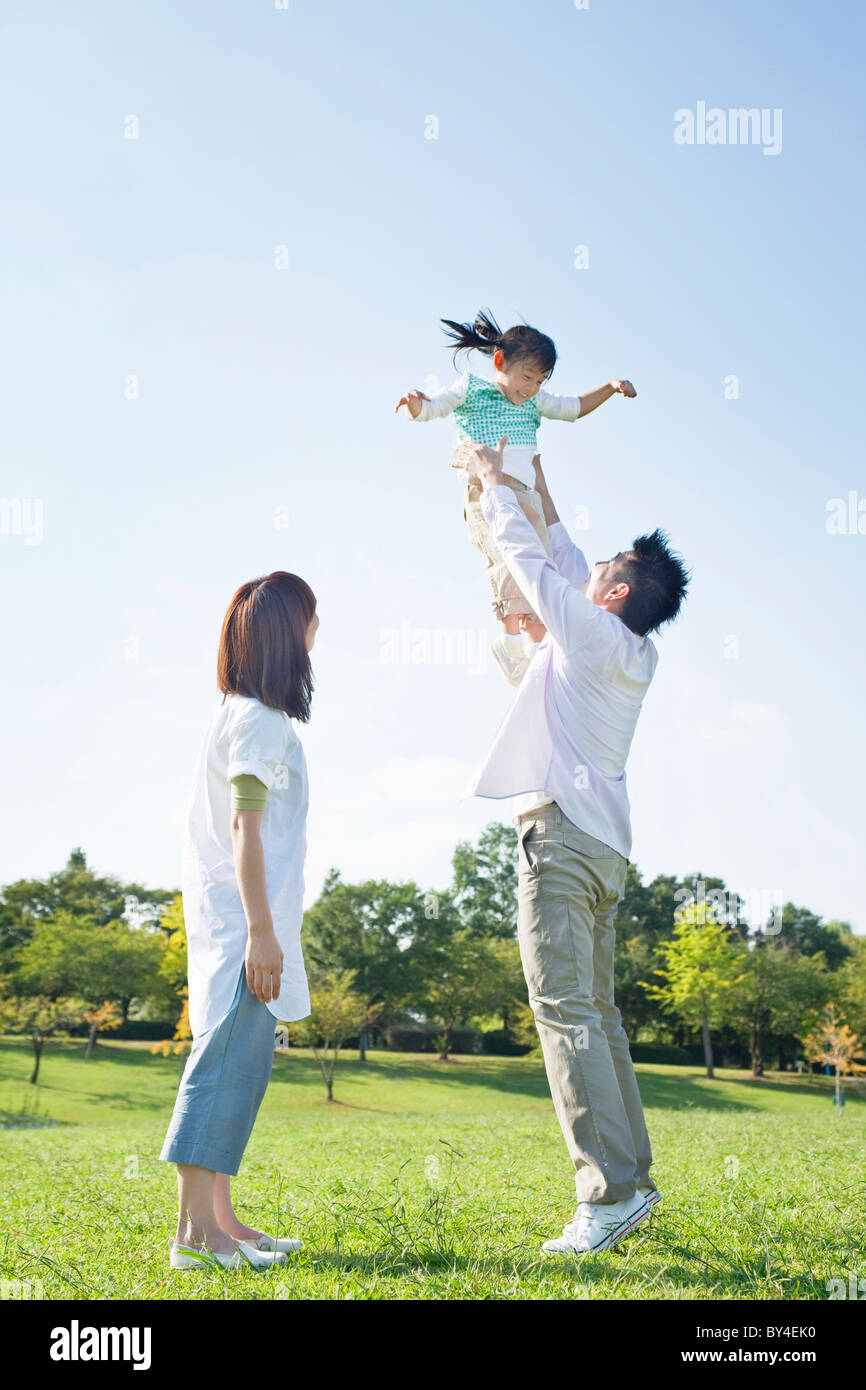 Father lifting up daughter Stock Photo - Alamy