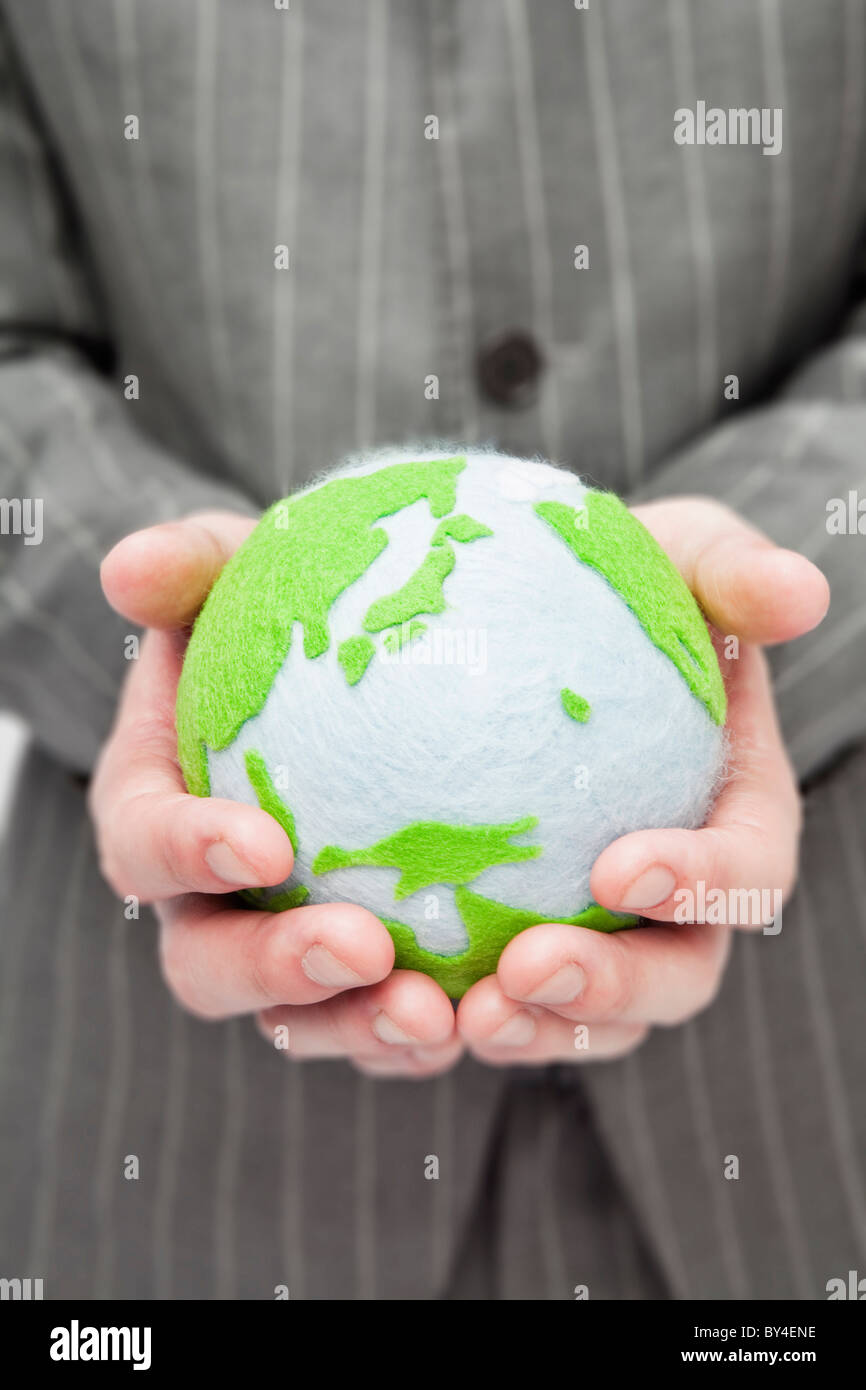 Globe hands business hi-res stock photography and images - Alamy