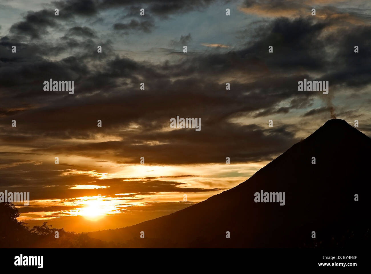 Arenal volcano at dawn in Costa Rica Stock Photo - Alamy