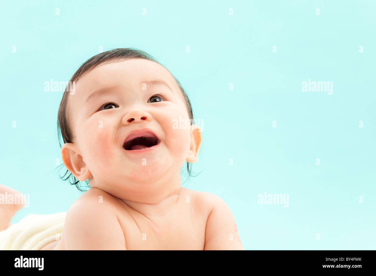 Baby Boy Looking Up Stock Photo - Alamy