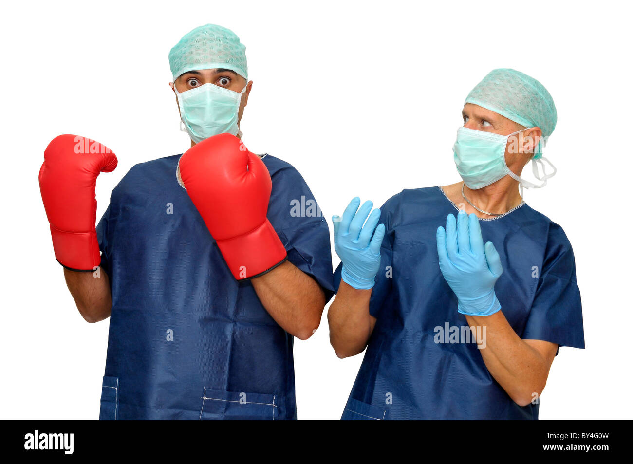 Surprised doctors team with boxing gloves, isolated in white Stock ...